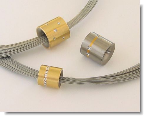 Barrel pendants with diamonds